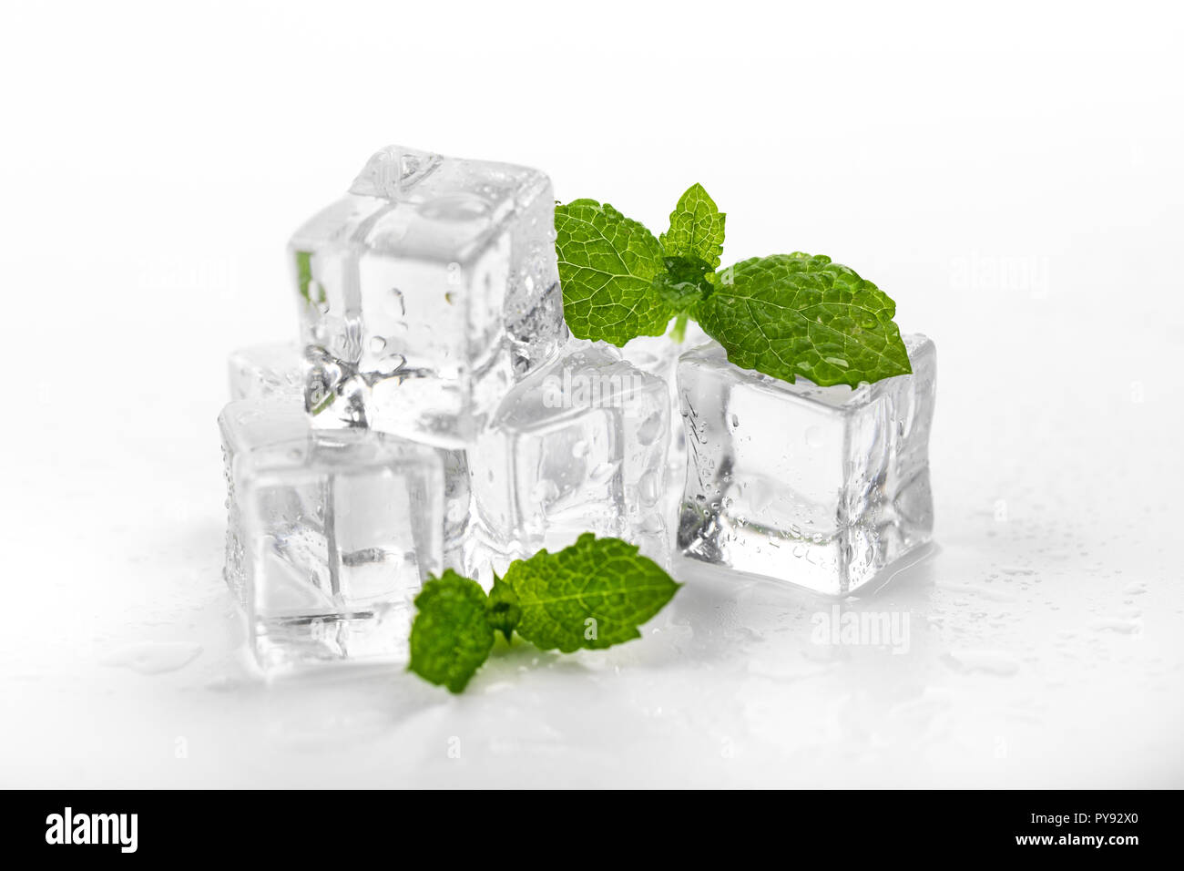 mint and ice cubes isolated on white background Stock Photo - Alamy