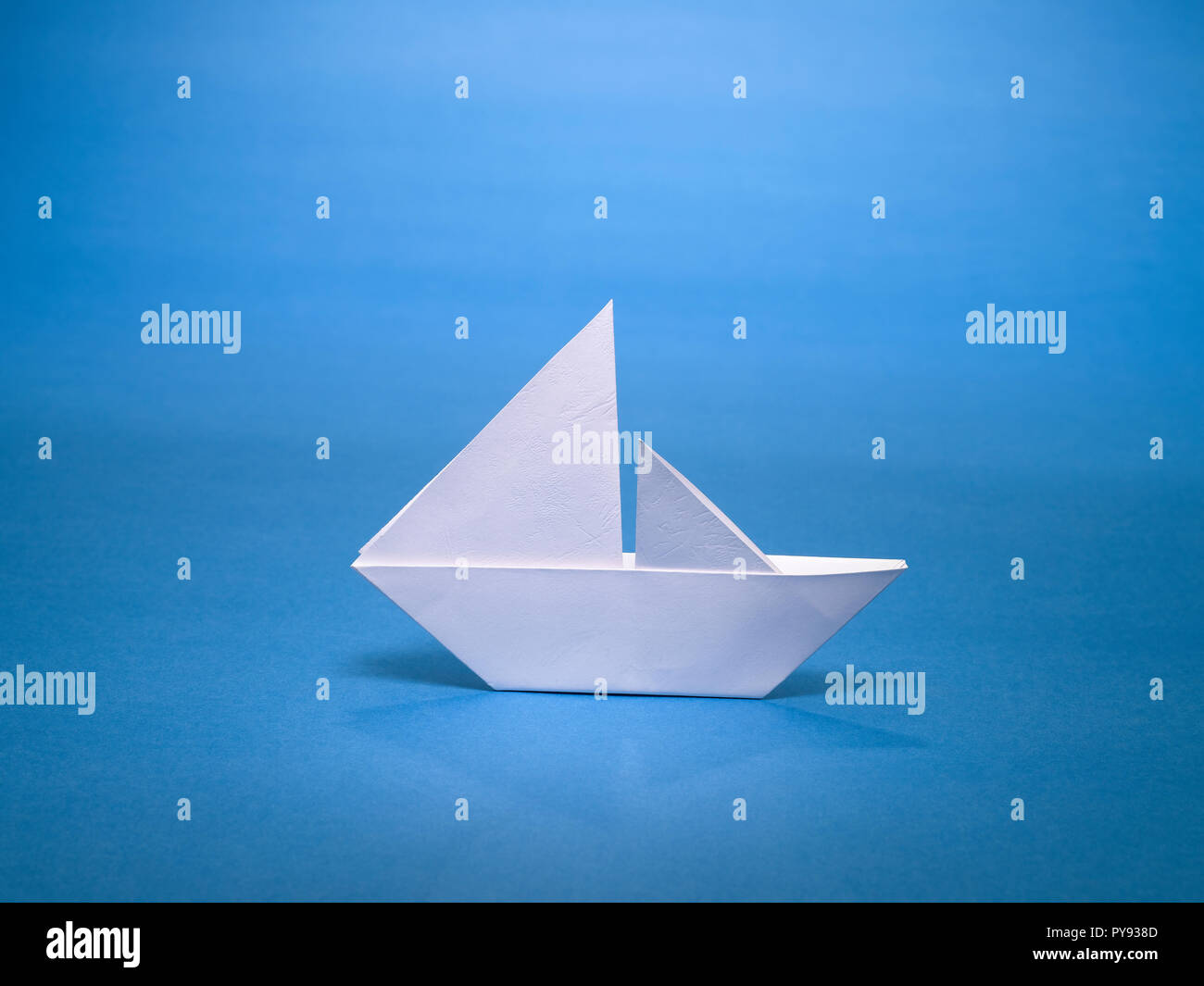 A STILL LIFE OF A PAPER SAIL BOAT MADE WITH THE ART OF ORIGAMI Stock ...