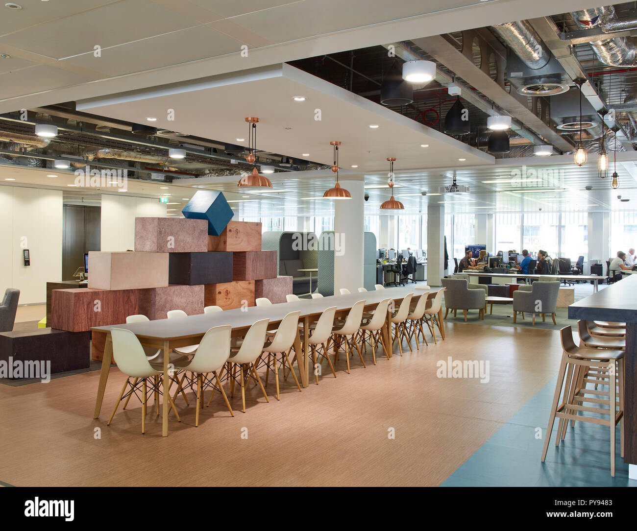 Funky Office interior towards large central table. Architectural Stock ...
