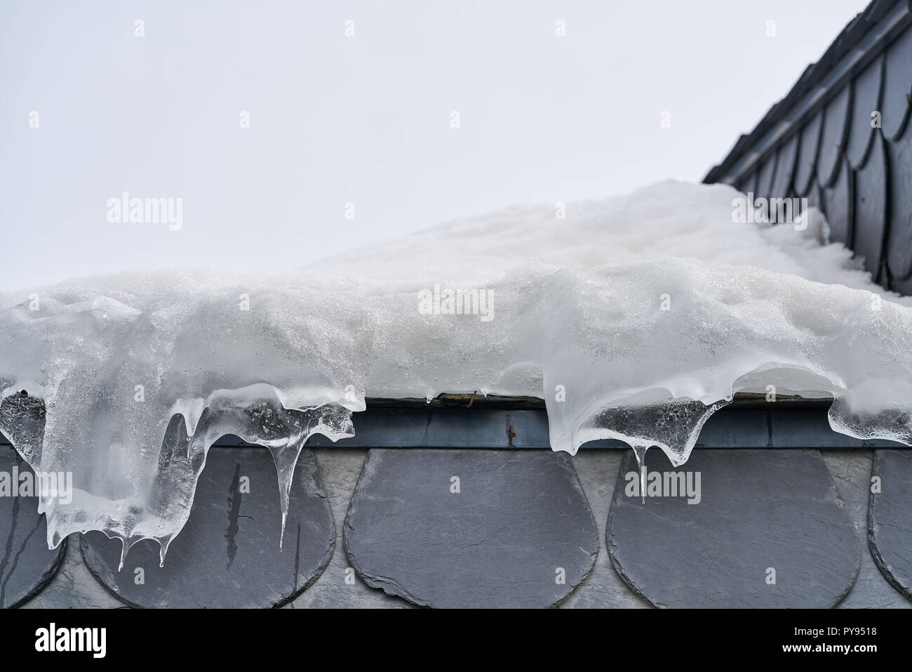 Iced roof closeup detail background in Andorra Stock Photo - Alamy