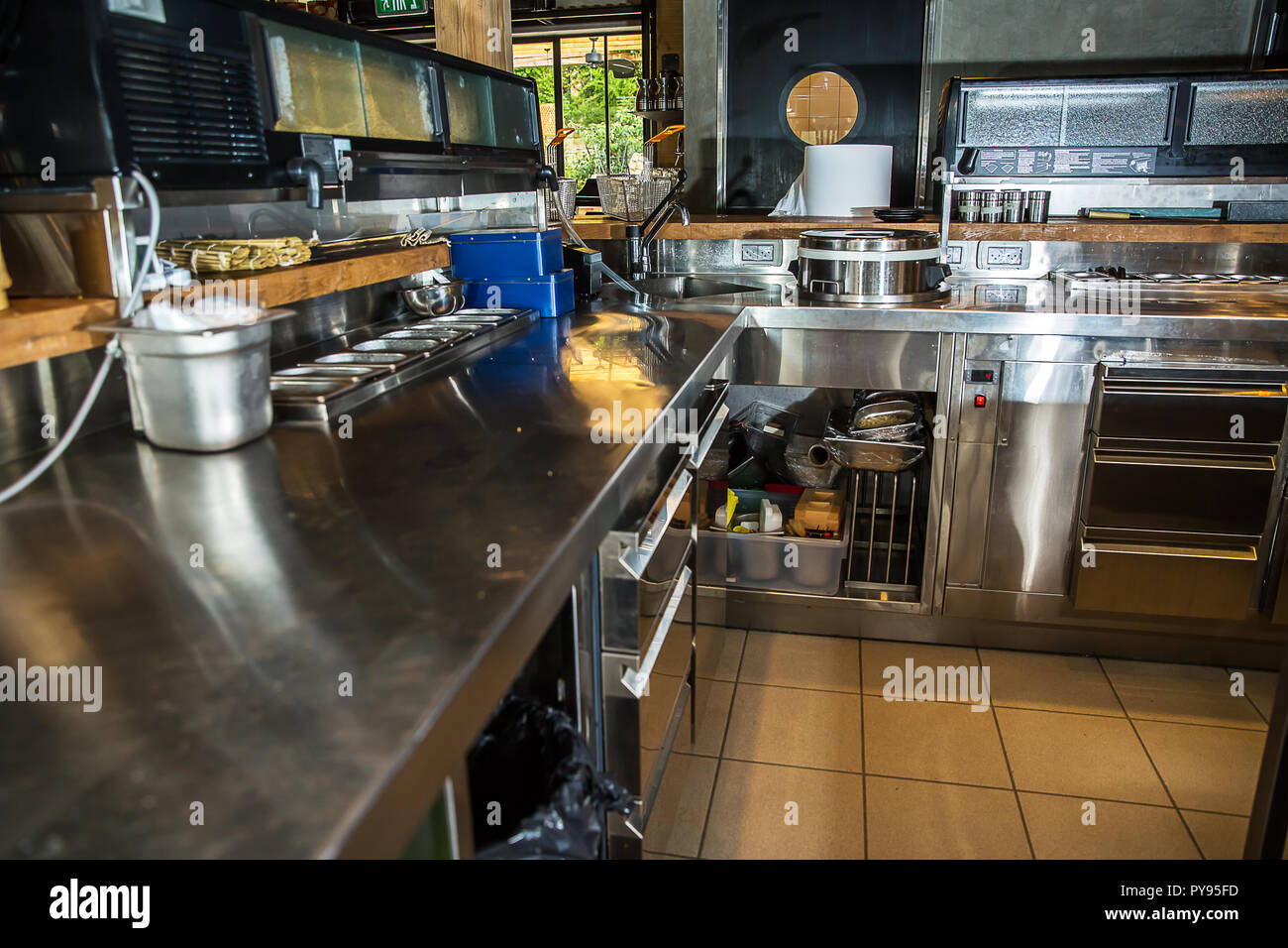 Professional kitchen, view counter in stainless steel Stock Photo - Alamy