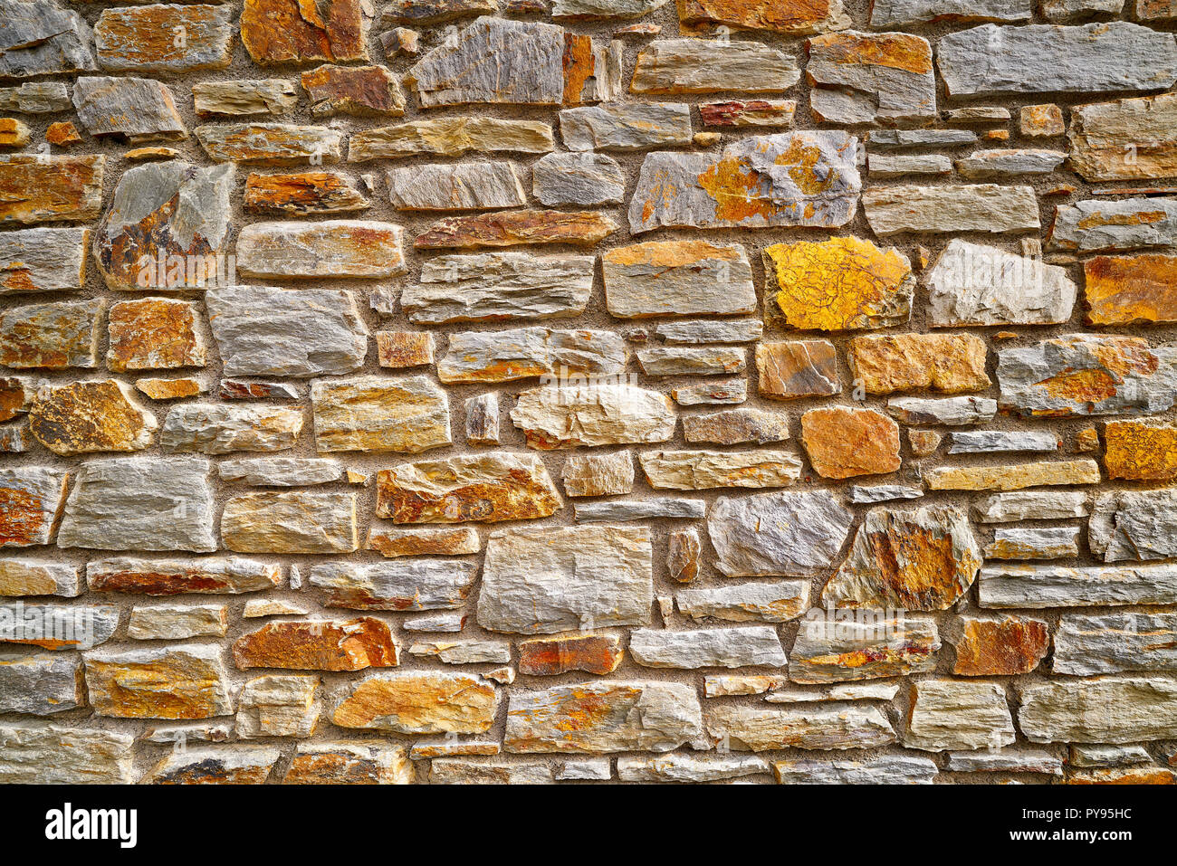 Slate stone masonry stone wall in Andorra Pyrenees Stock Photo - Alamy