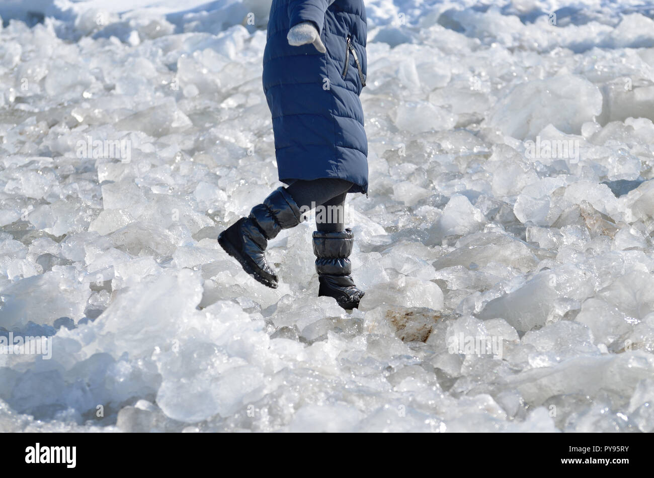 Difficult passage over the ice.Walking on broken ice is difficult and ...