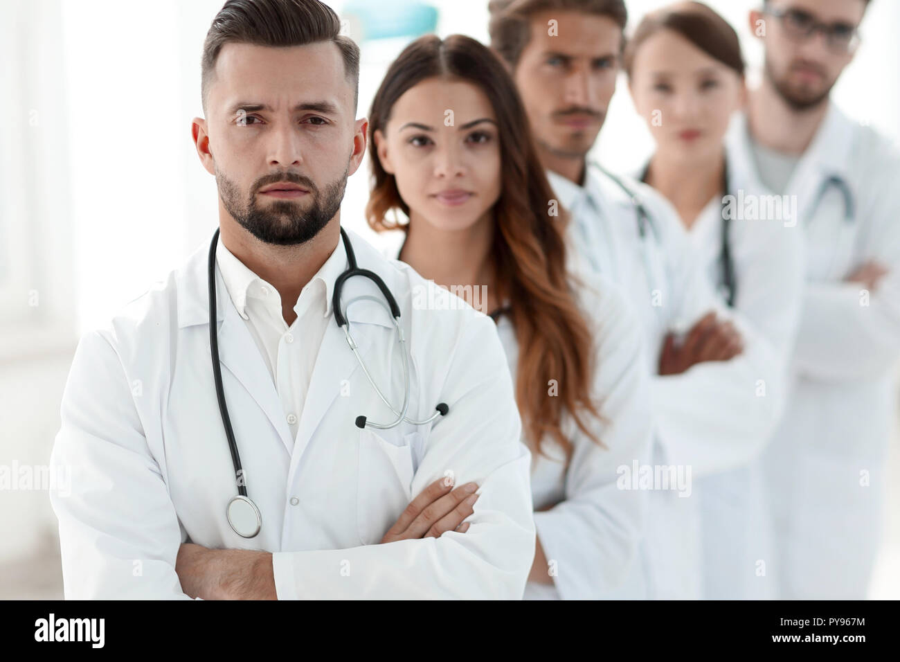Portrait of medical team standing together Stock Photo - Alamy