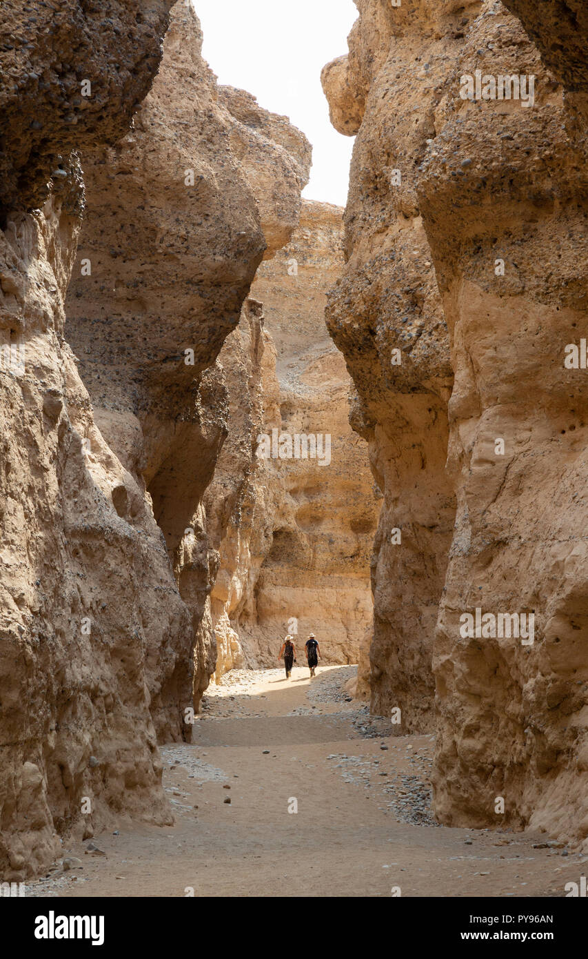 Namibia travel - tourists walking in the Sesriem Canyon, Namib desert ...