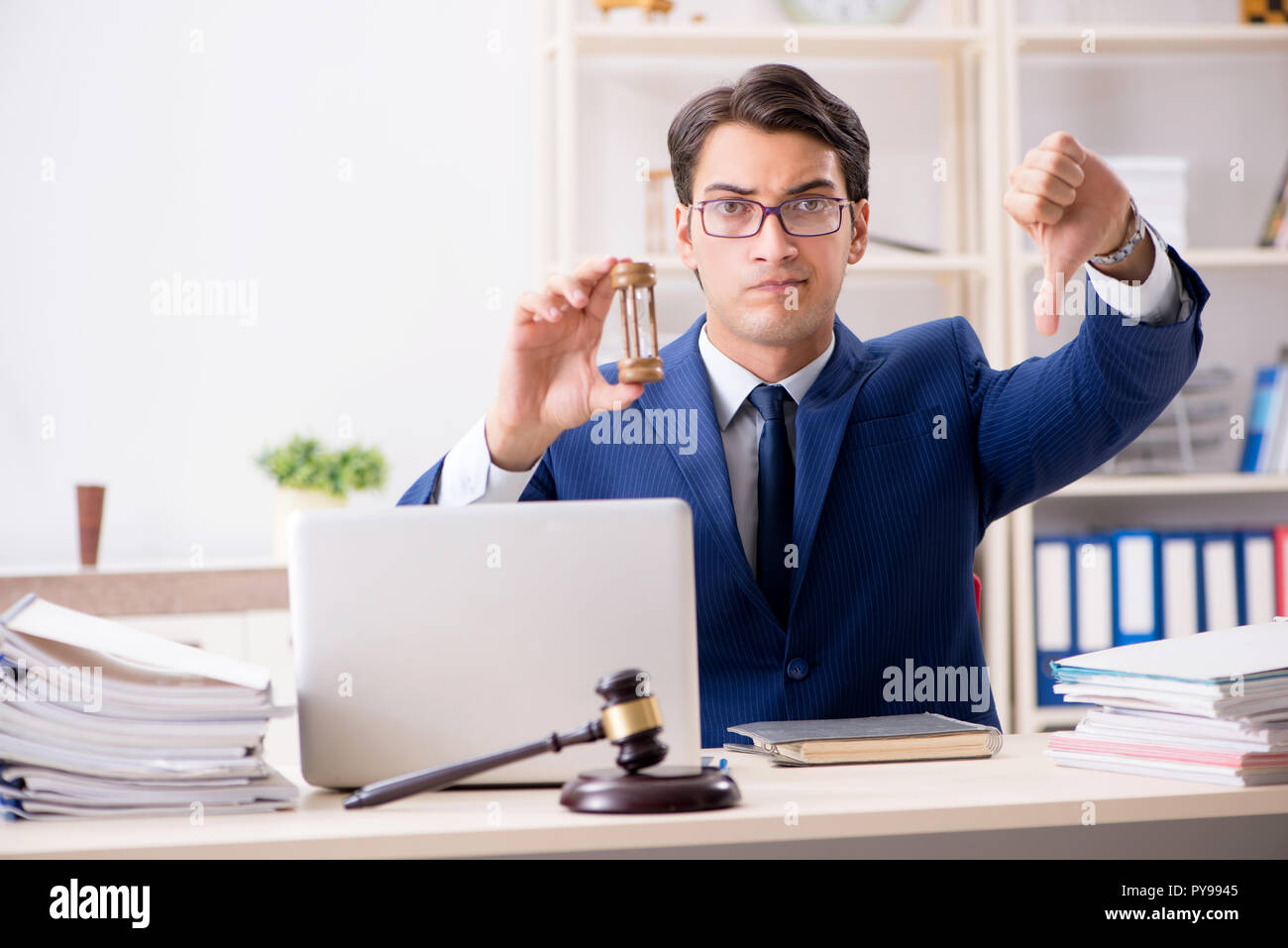 Young handsome judge working in court Stock Photo - Alamy