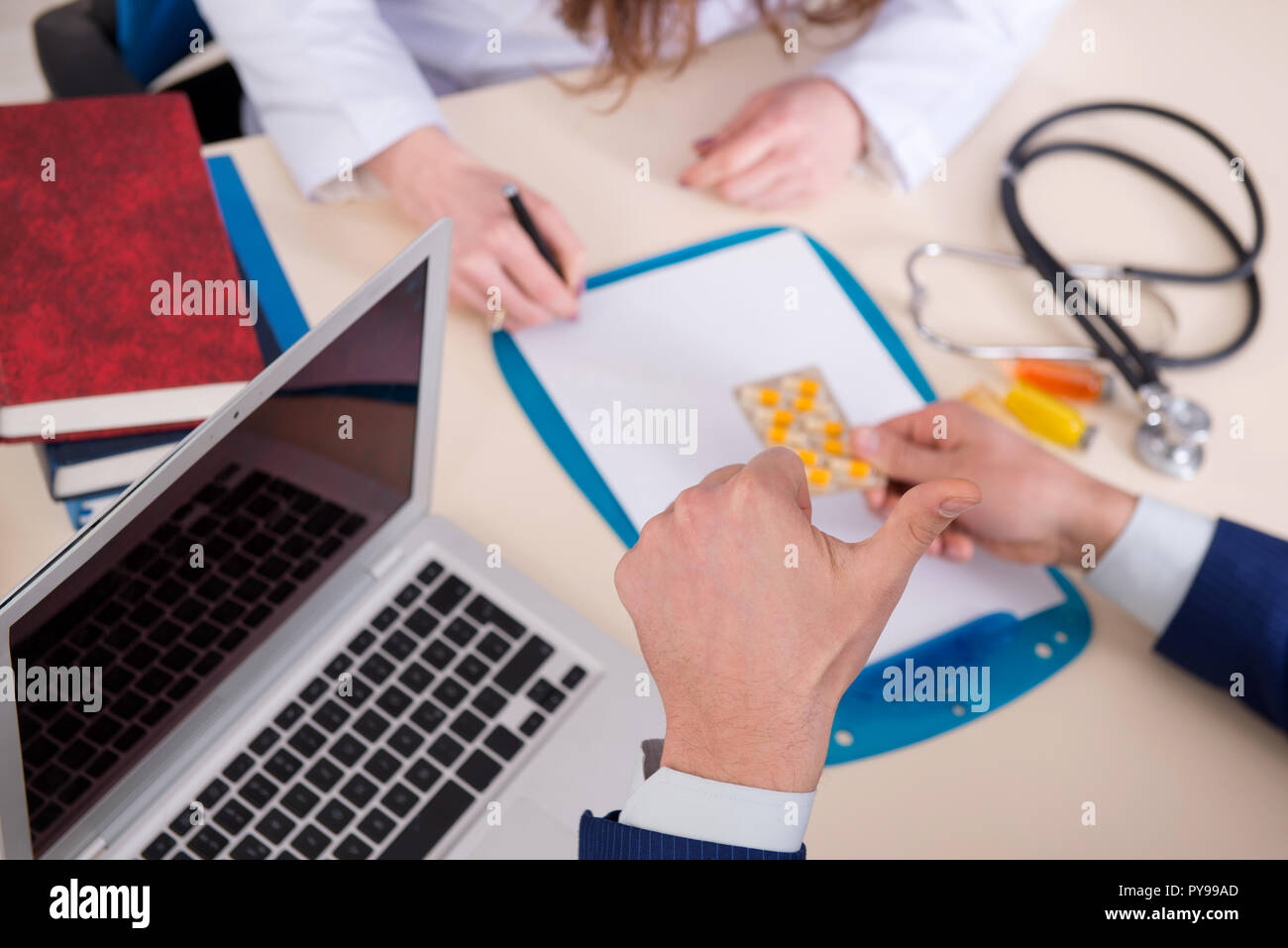 Man visiting doctor for routine check-up Stock Photo - Alamy