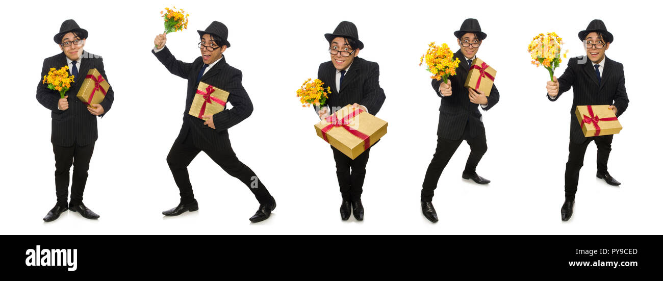 Funny man with flowers and giftbox Stock Photo - Alamy