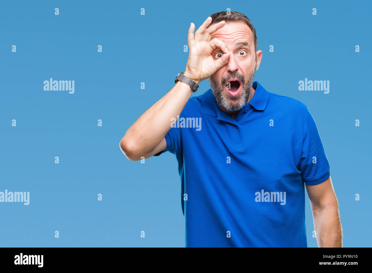 Middle age hoary senior man over isolated background doing ok gesture ...