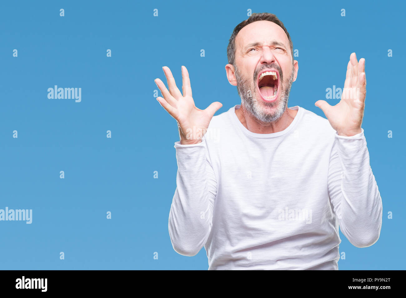 Middle age hoary senior man wearing white t-shirt over isolated ...