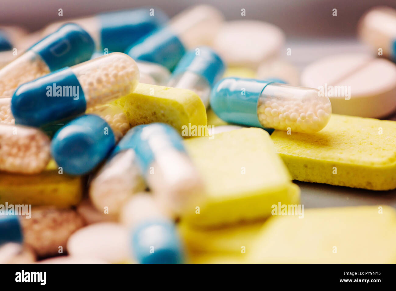 Pharmaceutical pills and capsules background Stock Photo - Alamy
