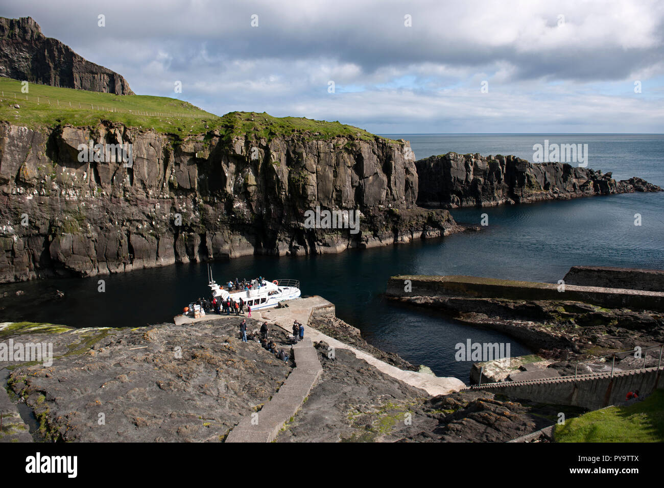 Boat arrival on Mykines, Faroe Islands Stock Photo - Alamy