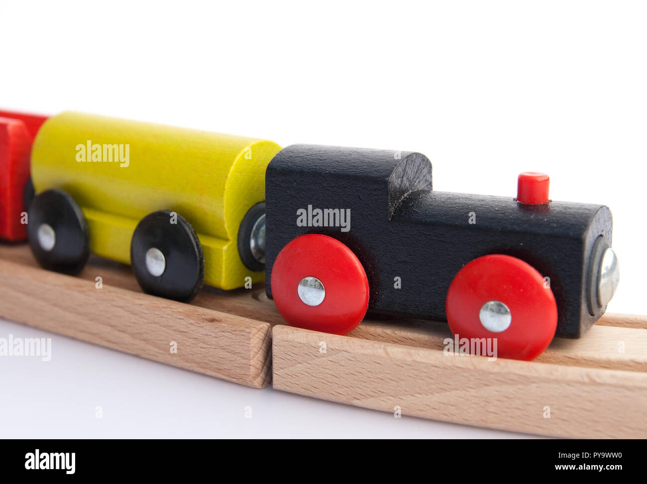 Wooden toy train on track hi-res stock photography and images - Alamy