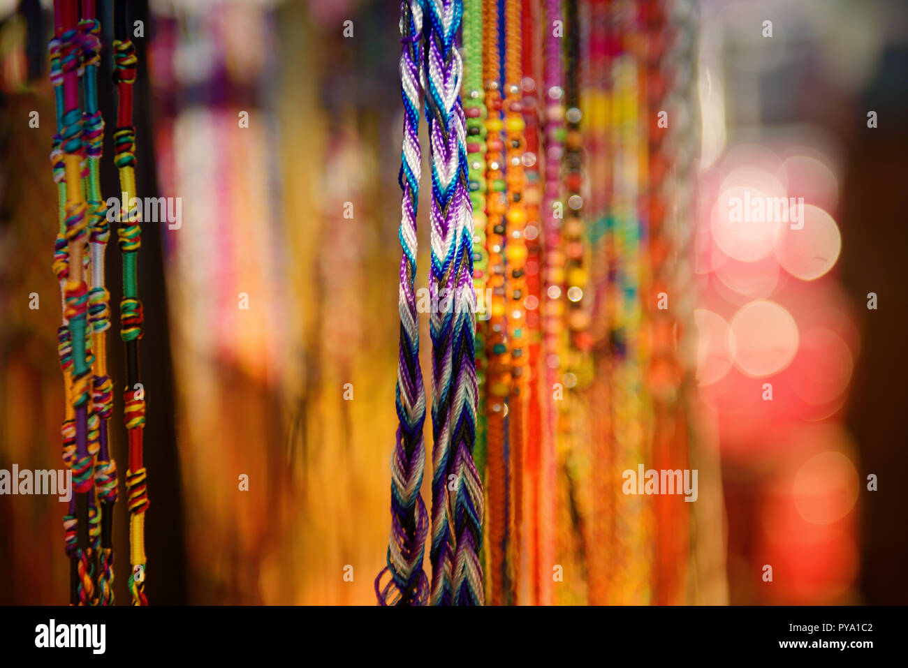 Colorful braided bracelets Stock Photo - Alamy