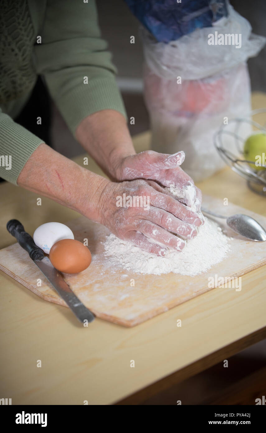 Lady rolling pastry hi-res stock photography and images - Alamy