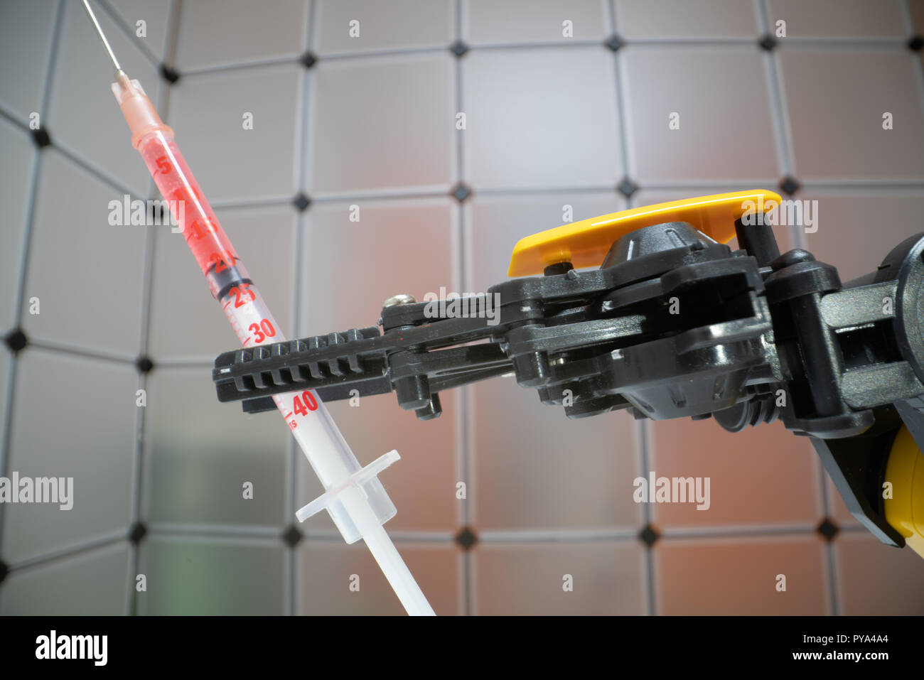robot arm with medical syringe Stock Photo - Alamy