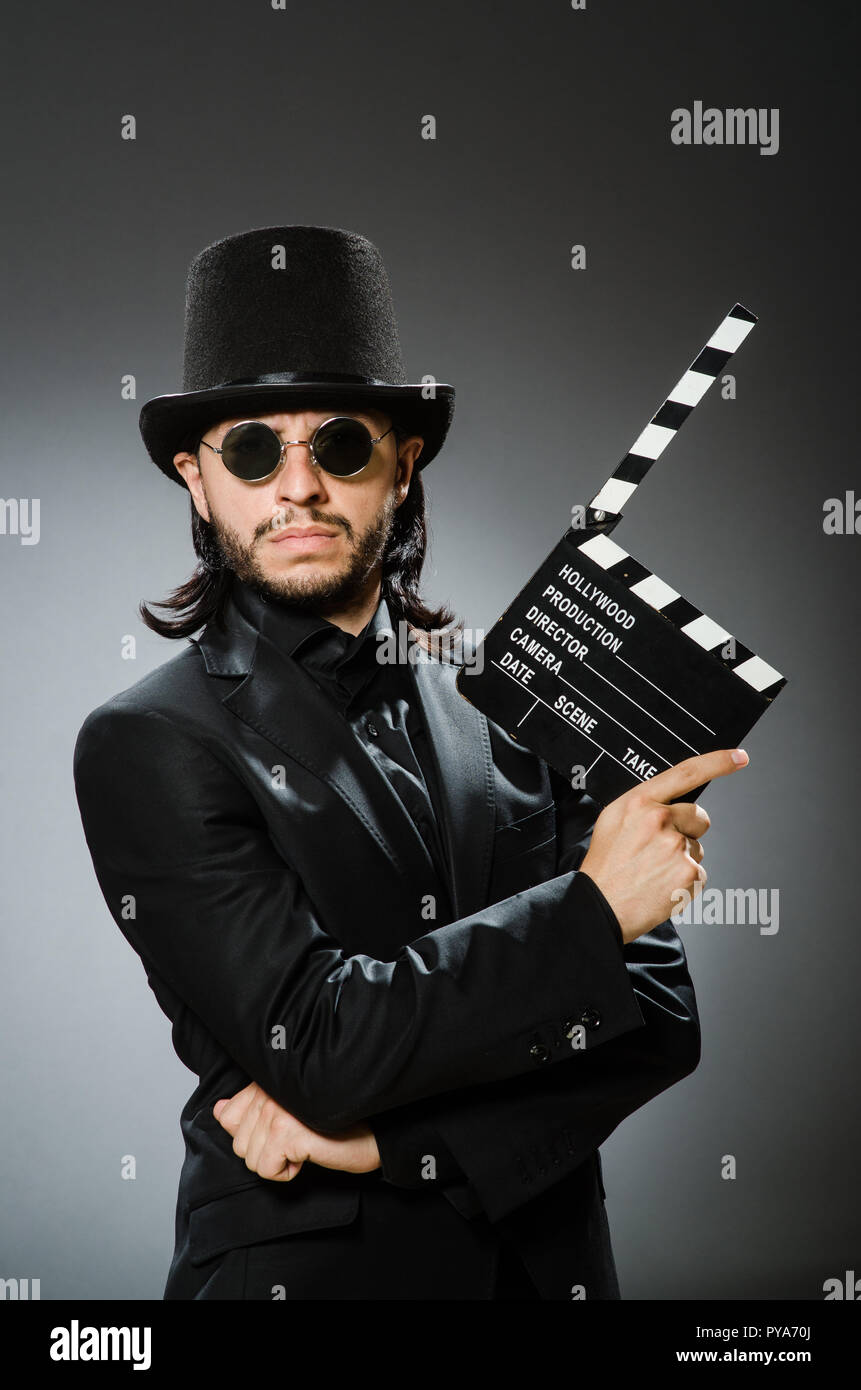 Vintage concept with man wearing black top hat Stock Photo - Alamy