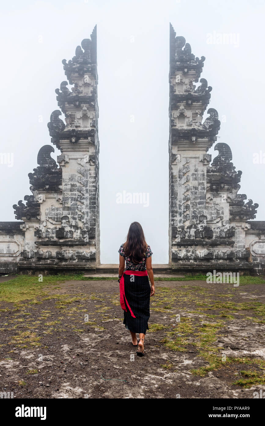 Woman in front of Traditional Balinese gate, Indonesia Stock Photo - Alamy