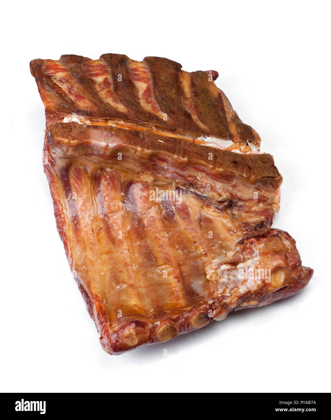 Smoked pork ribs isolated on white background Stock Photo - Alamy