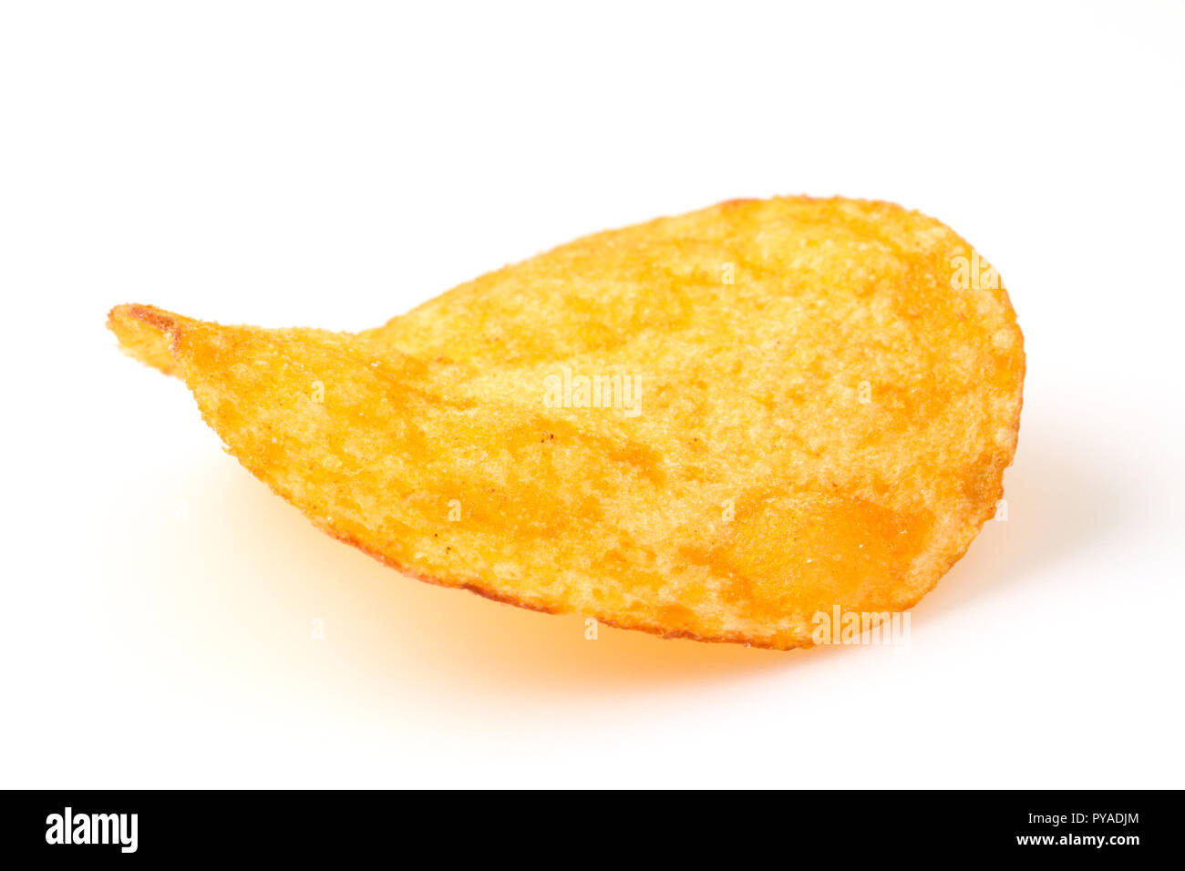 Golden crisp on a white background Stock Photo - Alamy