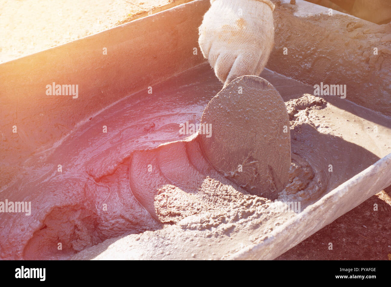 working hands interfere with trowel cement mortar for masonry Stock ...