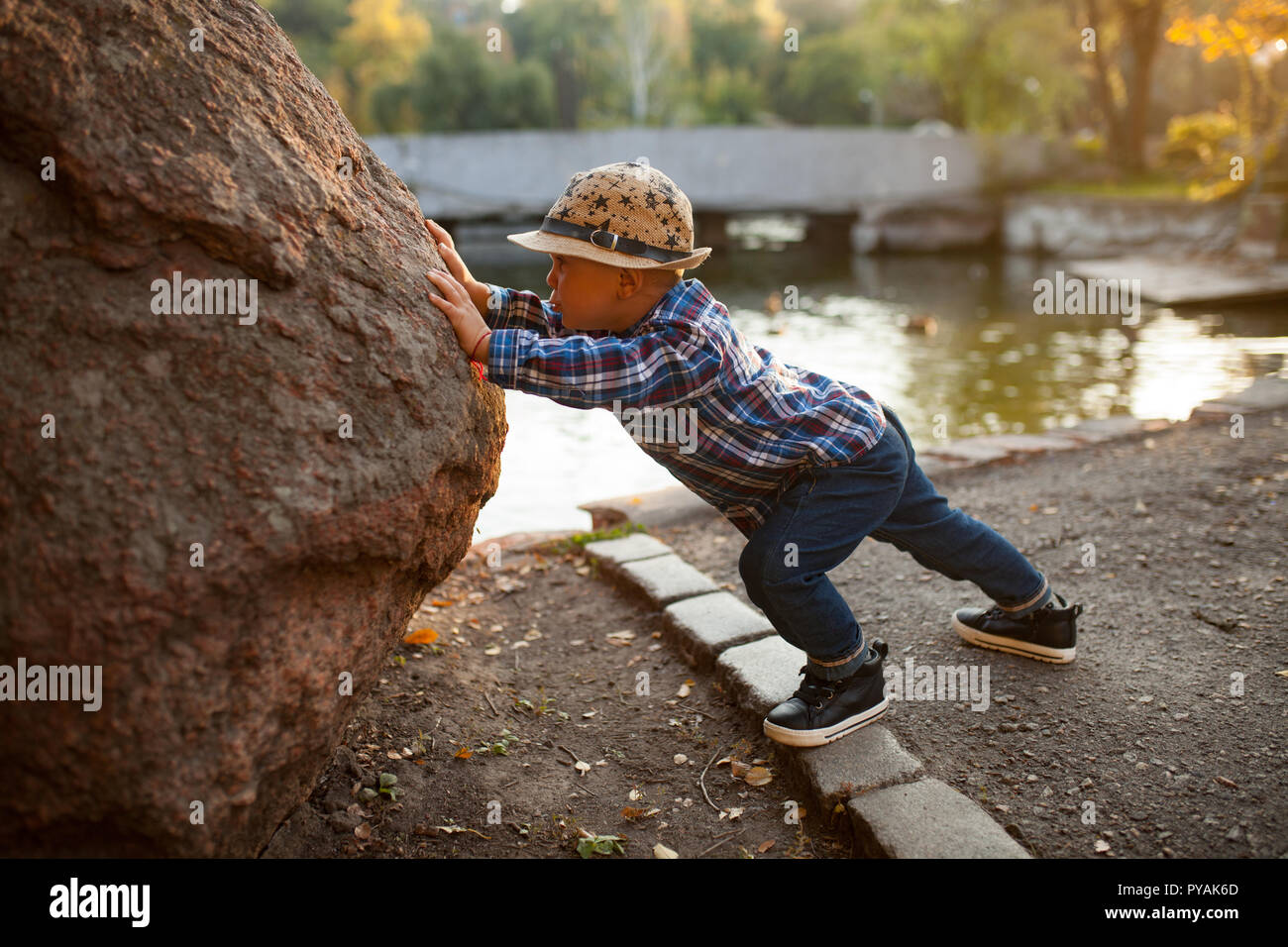 Pushing Rock High Resolution Stock Photography and Images - Alamy