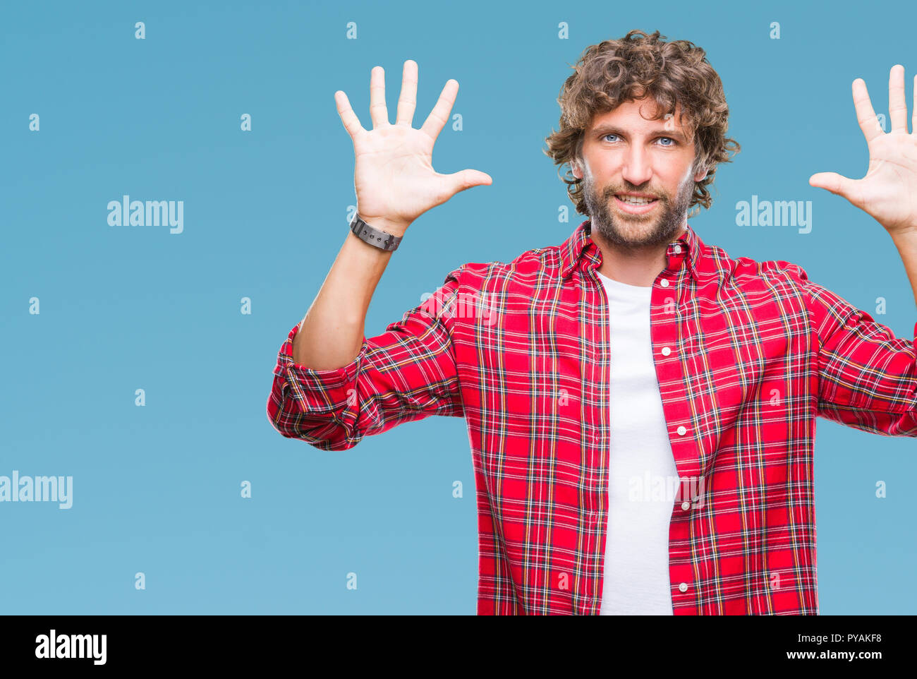 Handsome hispanic model man over isolated background showing and ...