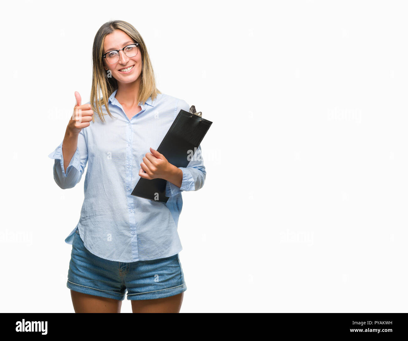 Young beautiful inspector business woman over isolated background happy ...