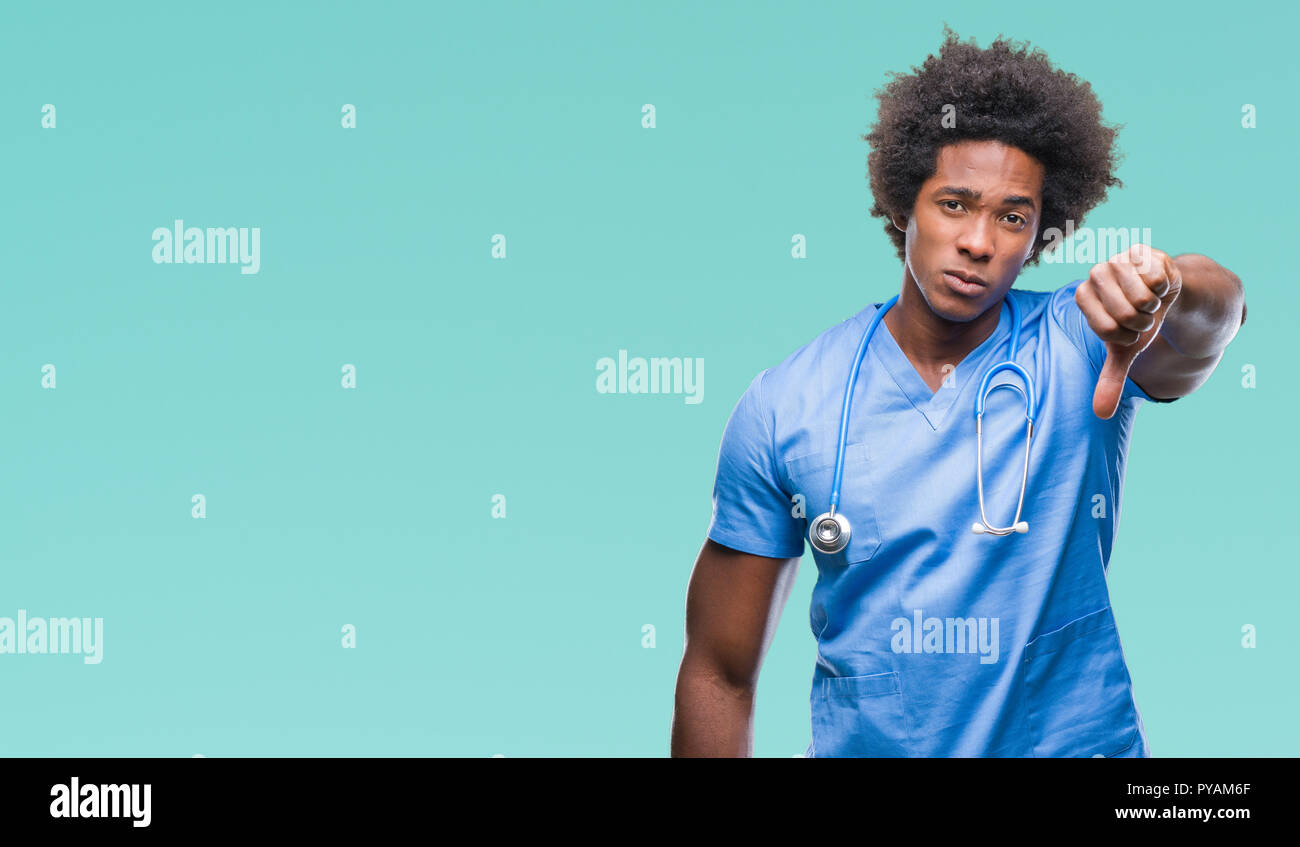 Afro american surgeon doctor man over isolated background looking ...