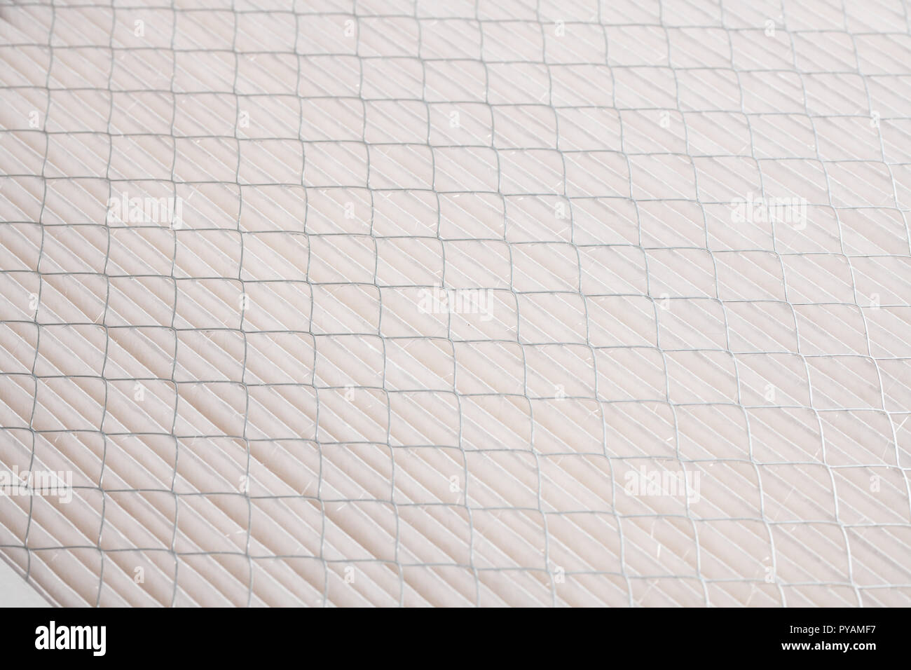 Close up pattern of a clean air furnace or air conditioning filter ...