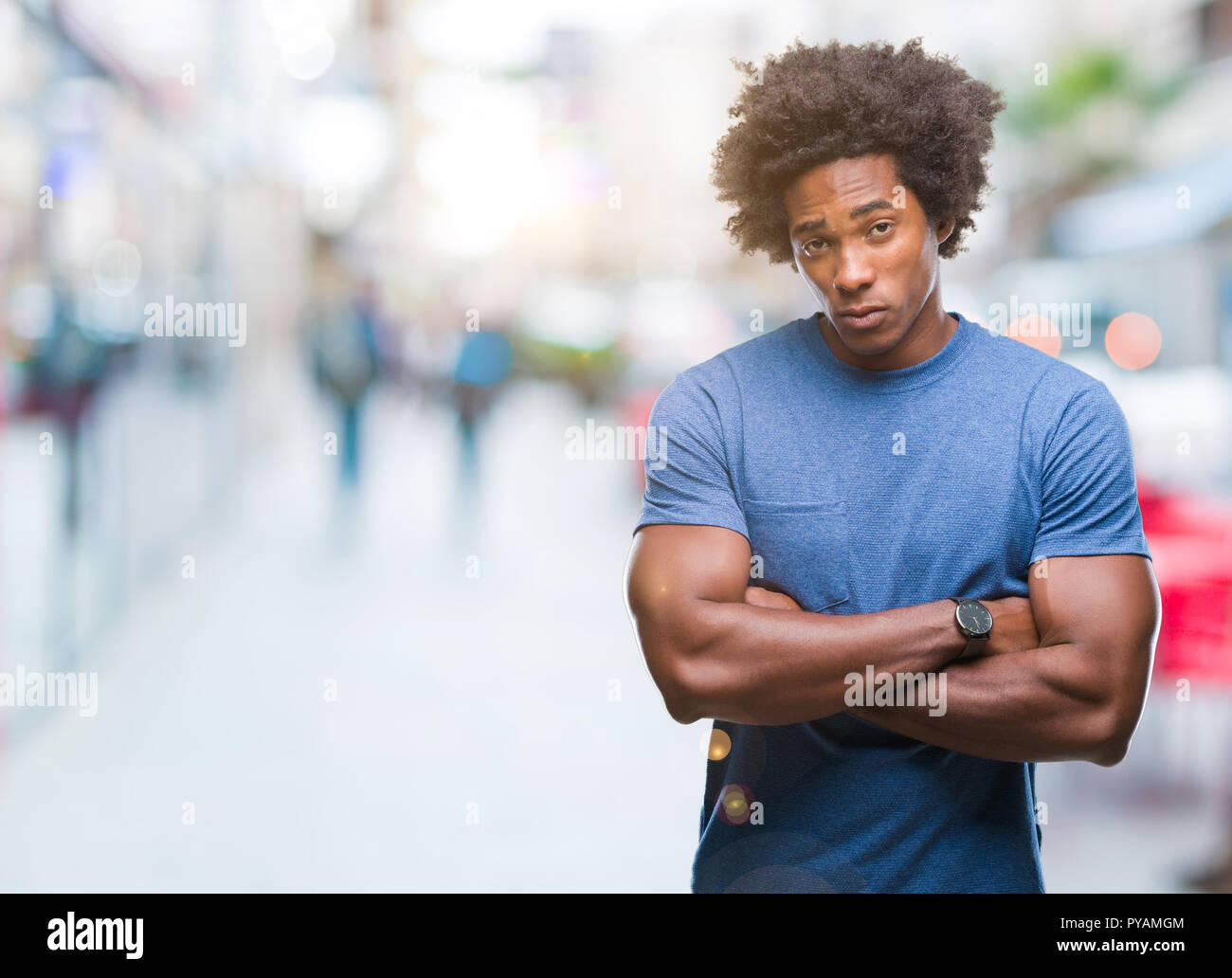 Afro american man over isolated background skeptic and nervous ...