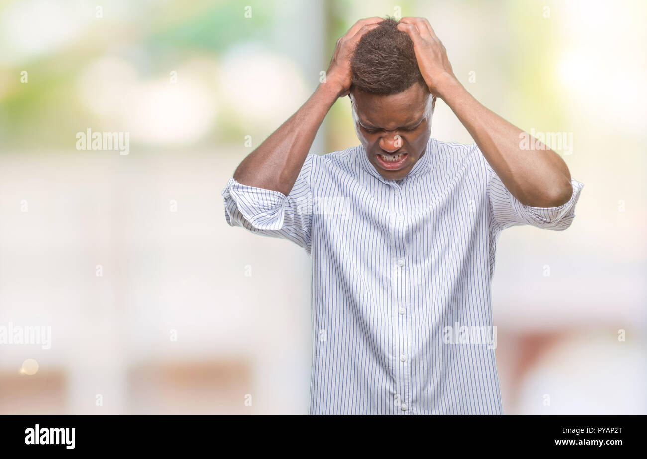 Young african american man over isolated background suffering from ...