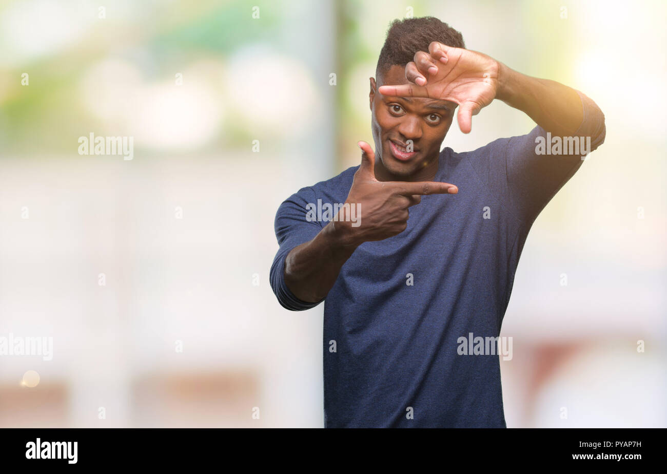 Young african american man over isolated background smiling making ...