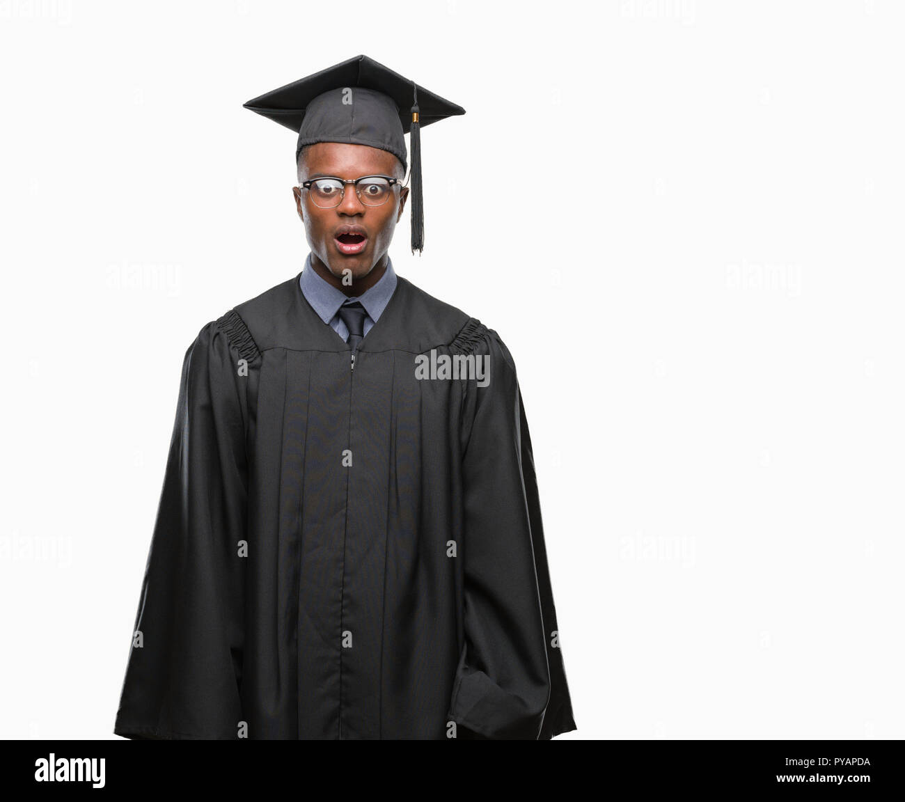 Young graduated african american man over isolated background afraid ...