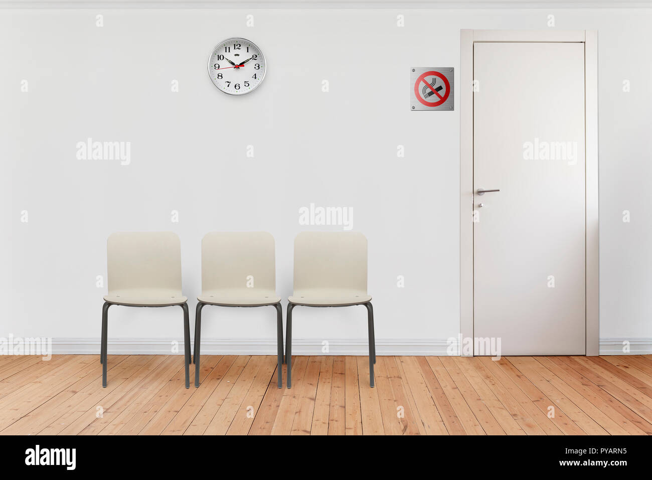 empty waiting room with chairs, clock on wall and close door with no ...