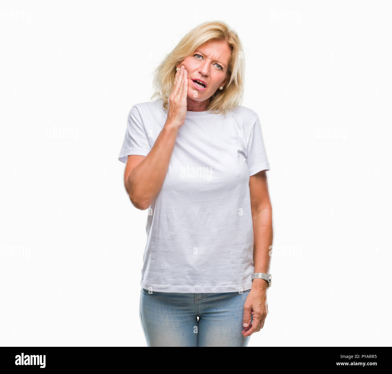 Middle age blonde woman over isolated background touching mouth with hand with painful ...