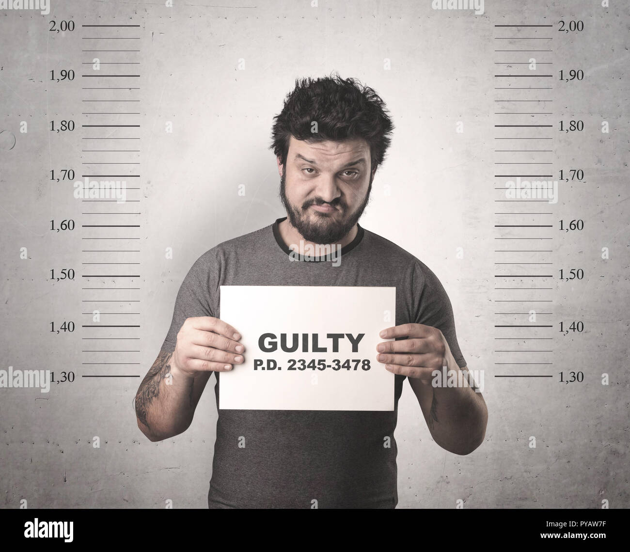 Caught guilty man with ID signs on his hand Stock Photo - Alamy