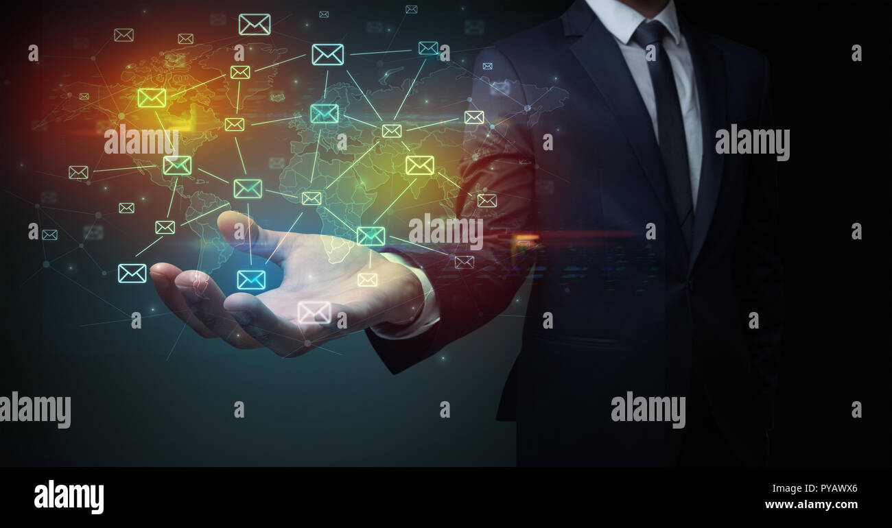 Elegant businessman holding communication concept on his hand Stock ...