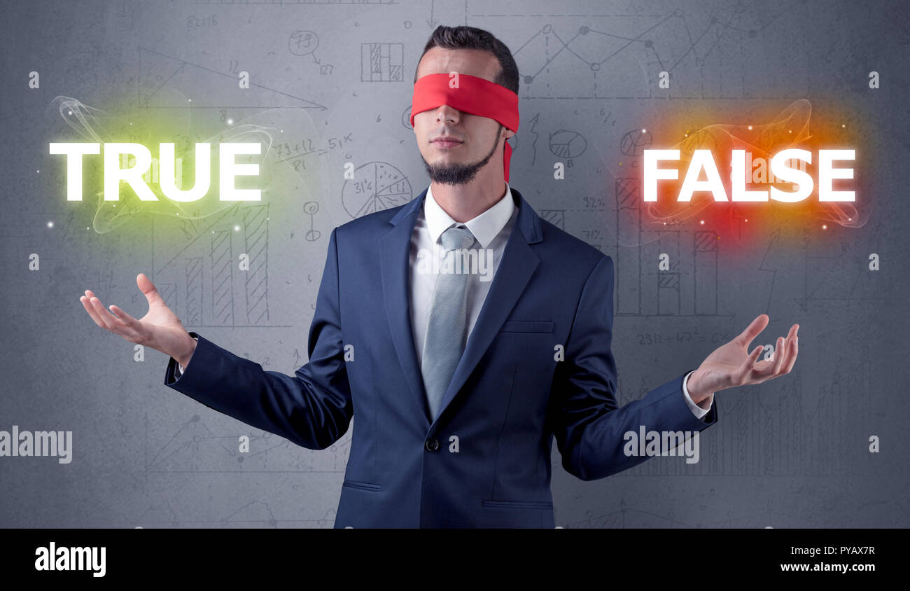 Businessman with red ribbon on his eye deciding true or false Stock ...