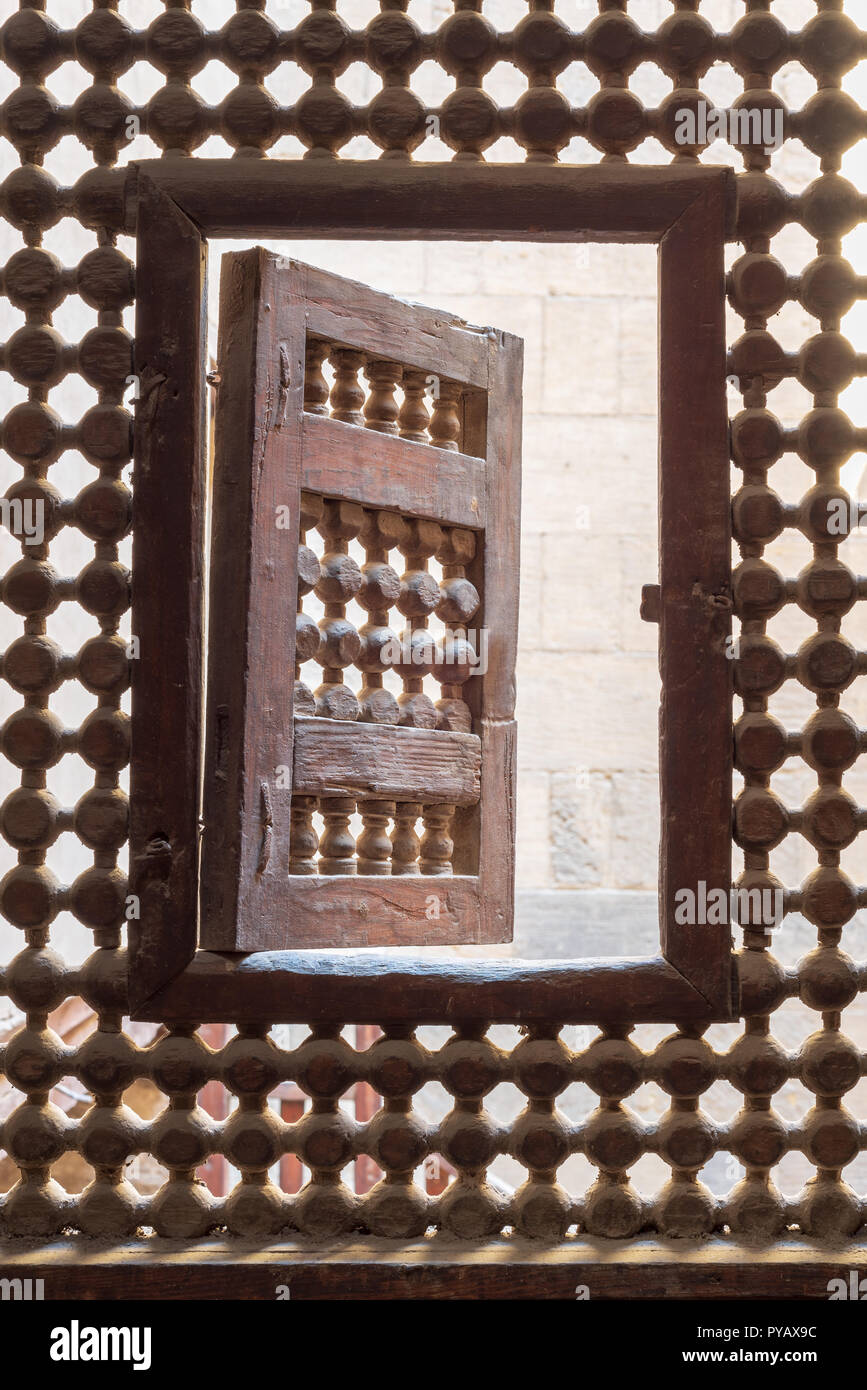 Wooden latticed window (Mashrabiya) with one small swinging sash, Cairo ...