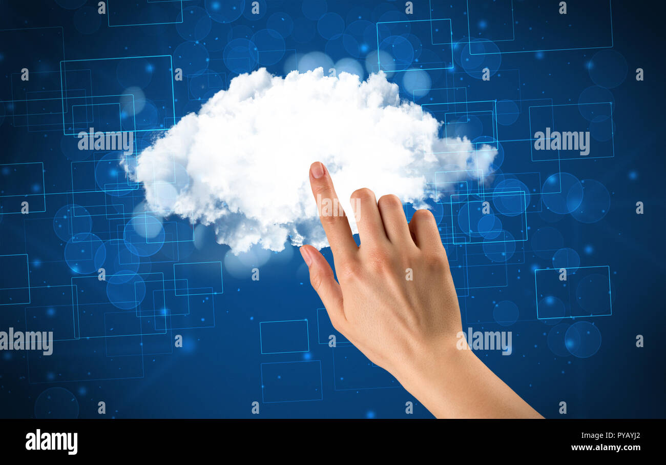 Female hand touching cloud with blue background Stock Photo - Alamy