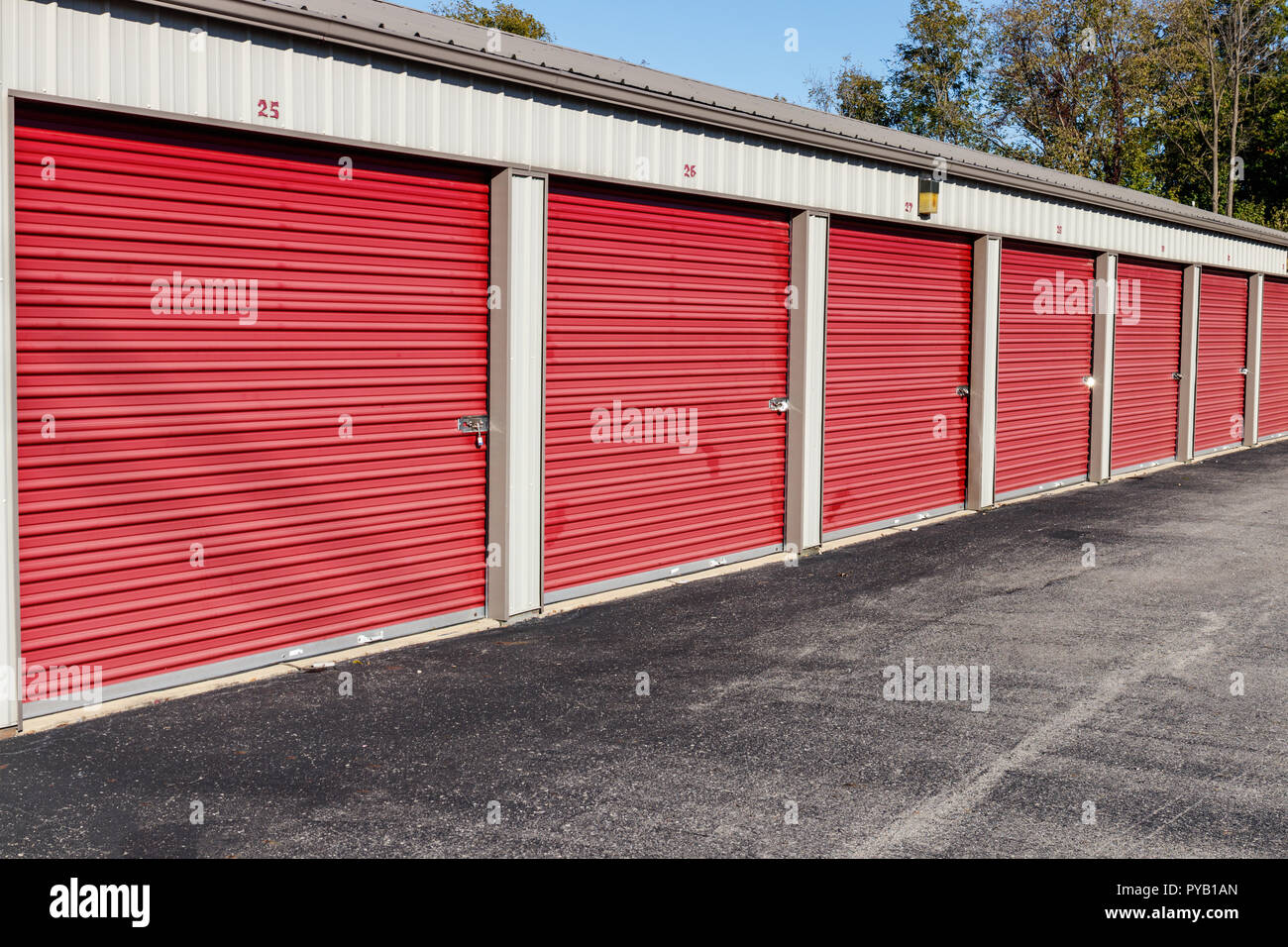 Numbered self storage and mini storage garage units Stock Photo - Alamy