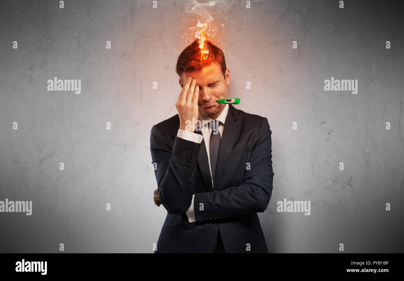 Fever businessman with burning head concept Stock Photo - Alamy