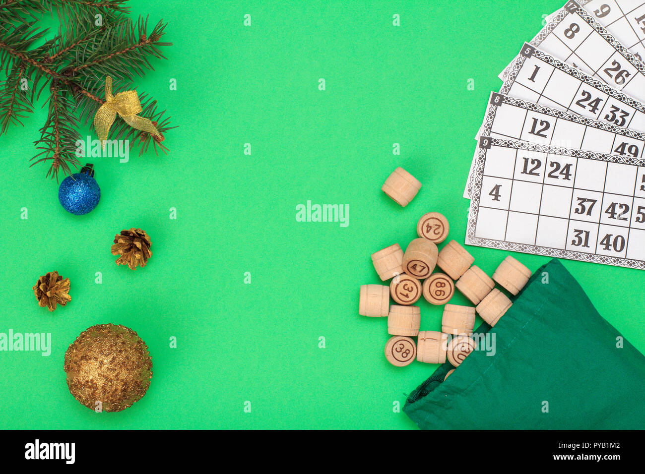Board game lotto. Wooden lotto barrels with bag and game cards for a ...