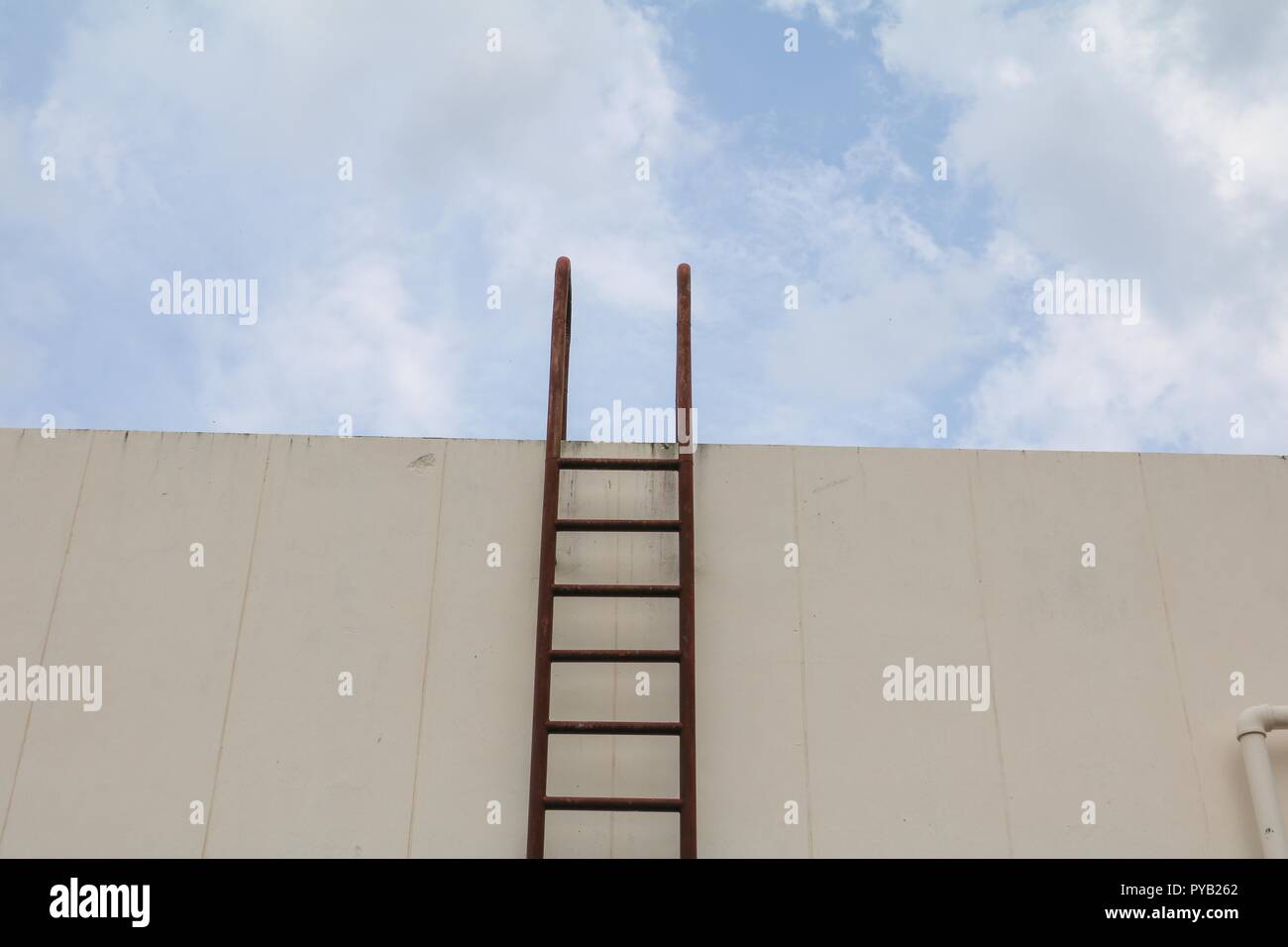 Staircase old vertical industrial metal rusted. to Water tank no safety ... Staircase old vertical industrial metal rusted. to Water tank no safety ...