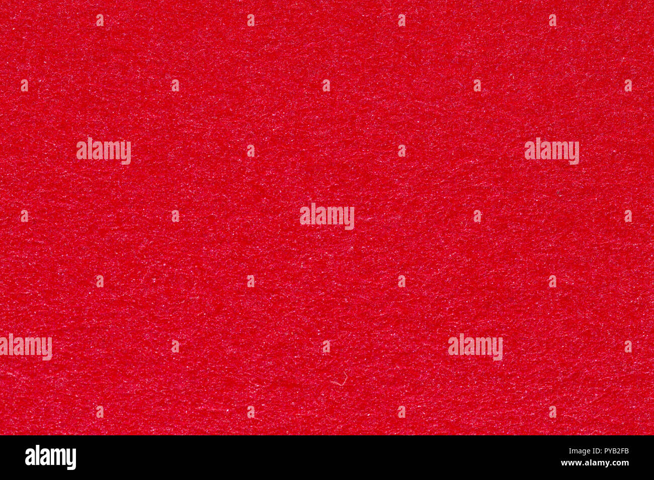 Crushed red highly textured background for christmas Stock Photo - Alamy