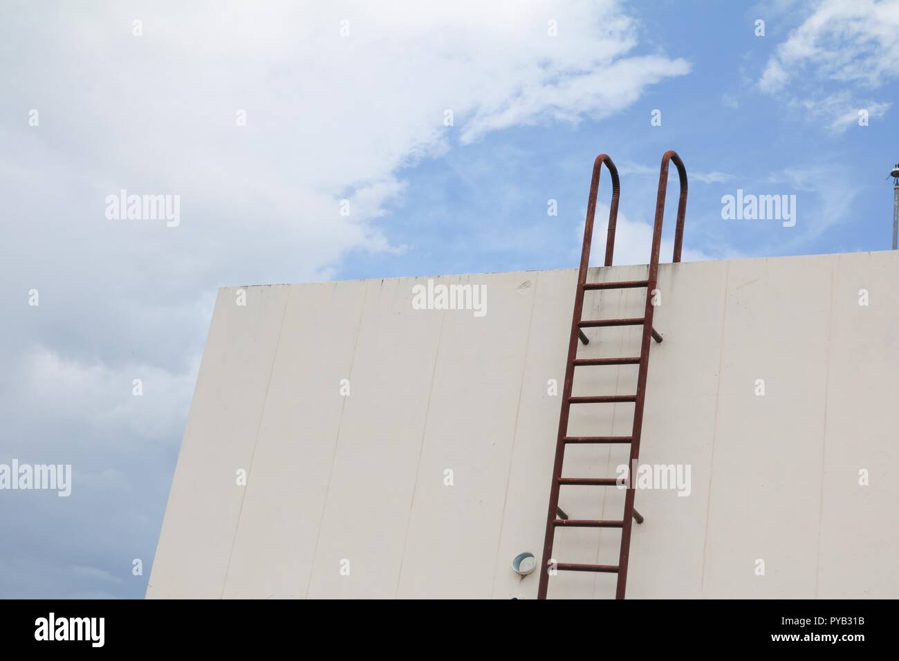 Staircase old vertical industrial metal rusted. to Water tank no safety ... Staircase old vertical industrial metal rusted. to Water tank no safety ...