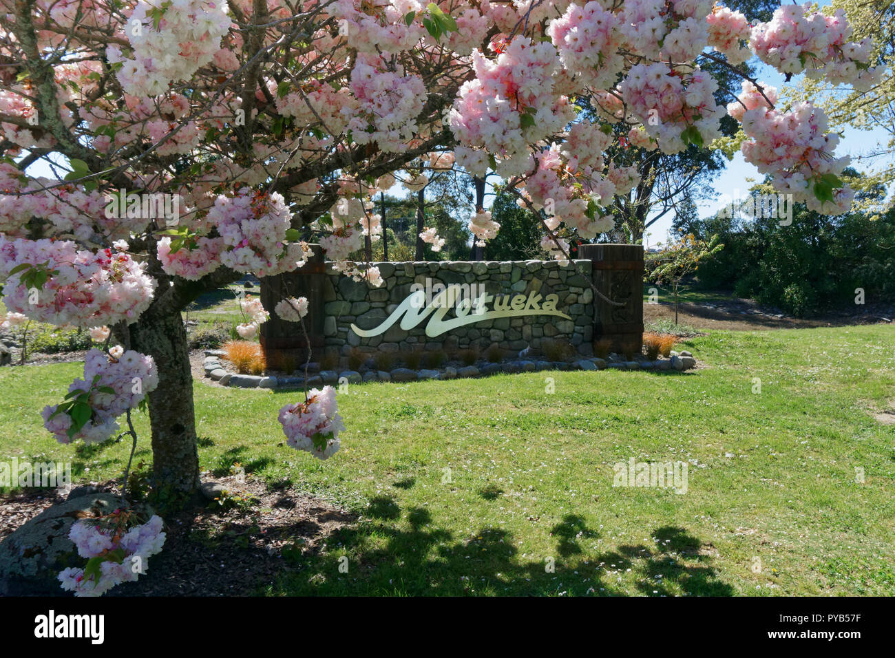 Motueka sign in the spring blossom, Motueka, New Zealand Stock Photo ...