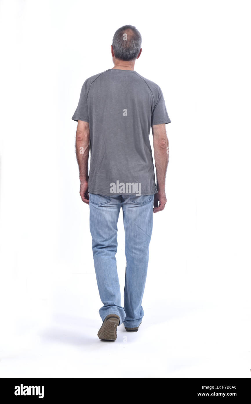 middle-aged man walking on white background Stock Photo - Alamy