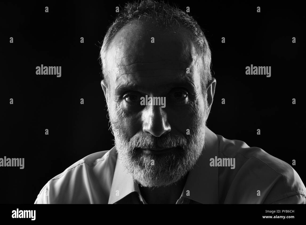 Middle aged man gray beard on white Black and White Stock Photos ...